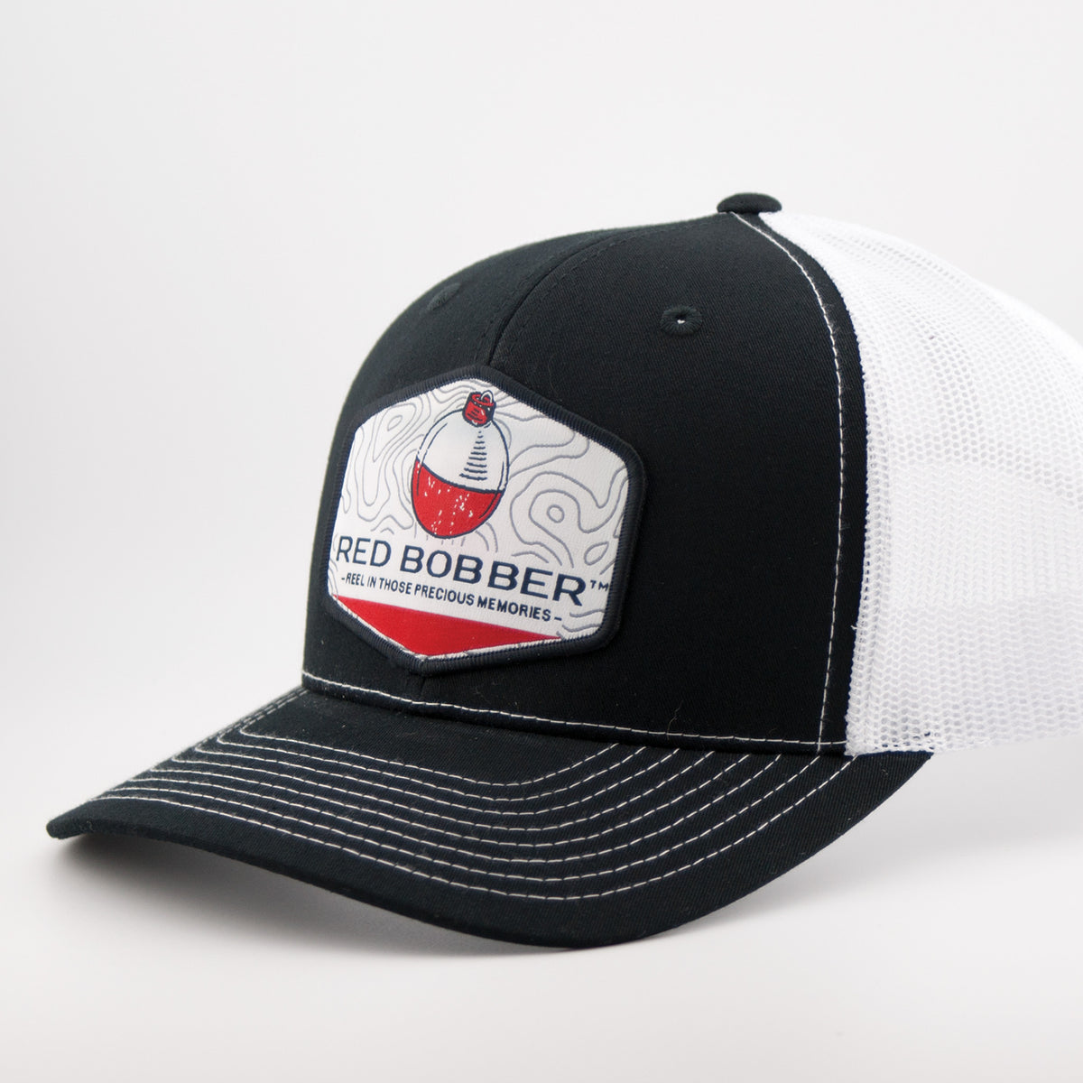 RED BOBBER™ TRUCKER CAP