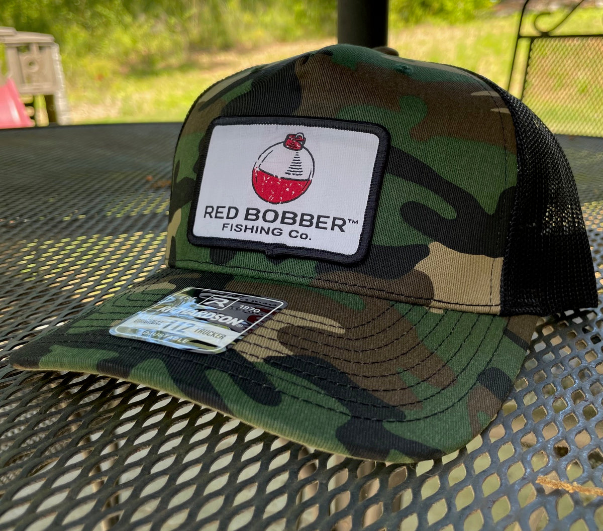 RED BOBBER™ TRUCKER CAP